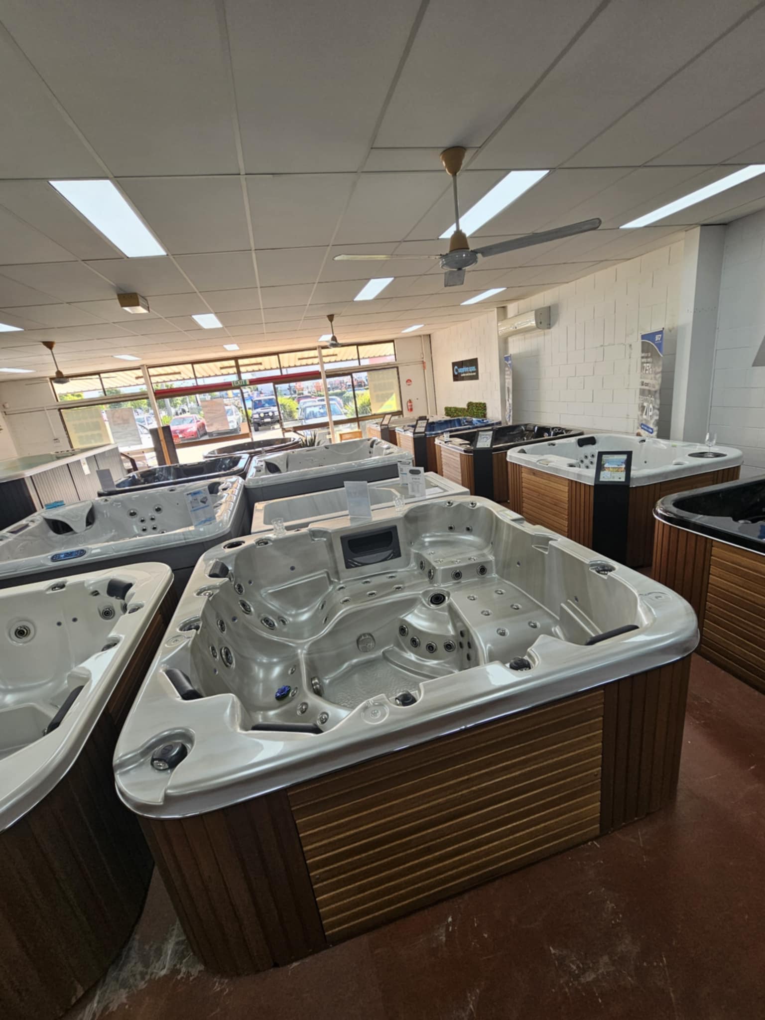 Spa Supa Centre showroom floor with spa pools on display in Brendale